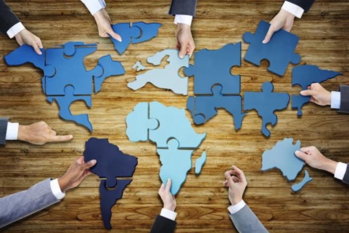 Cross-Border Mergers: Strategies, Benefits & Key Challenges